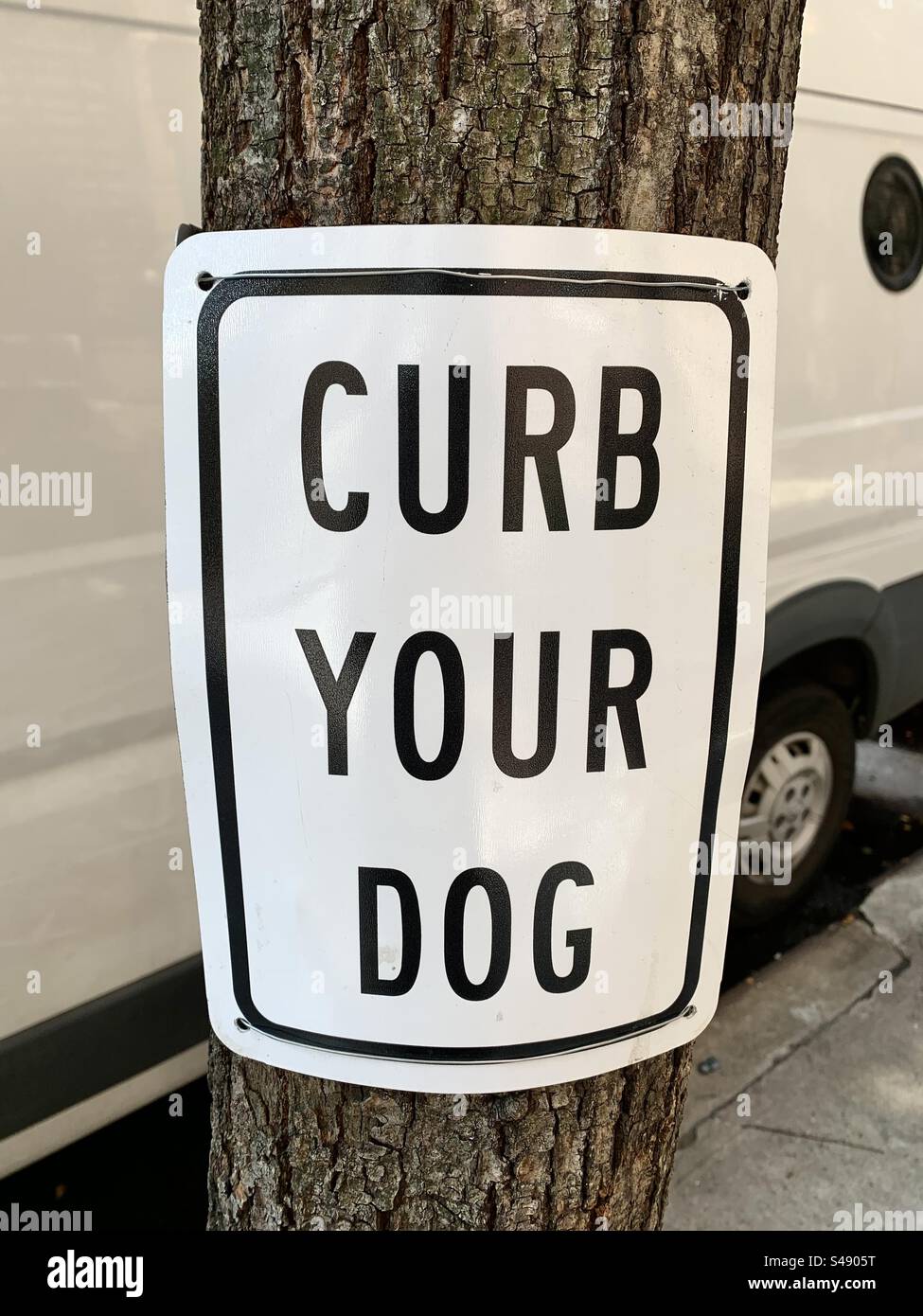 Curb your pet hi-res stock photography and images - Alamy