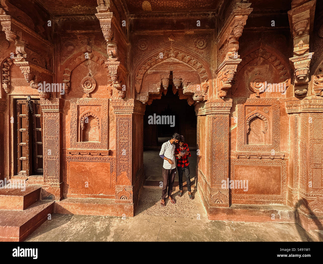 Indian tourists at Emperor Akbar’s palace in India at Fatehpur Sikri, a ...