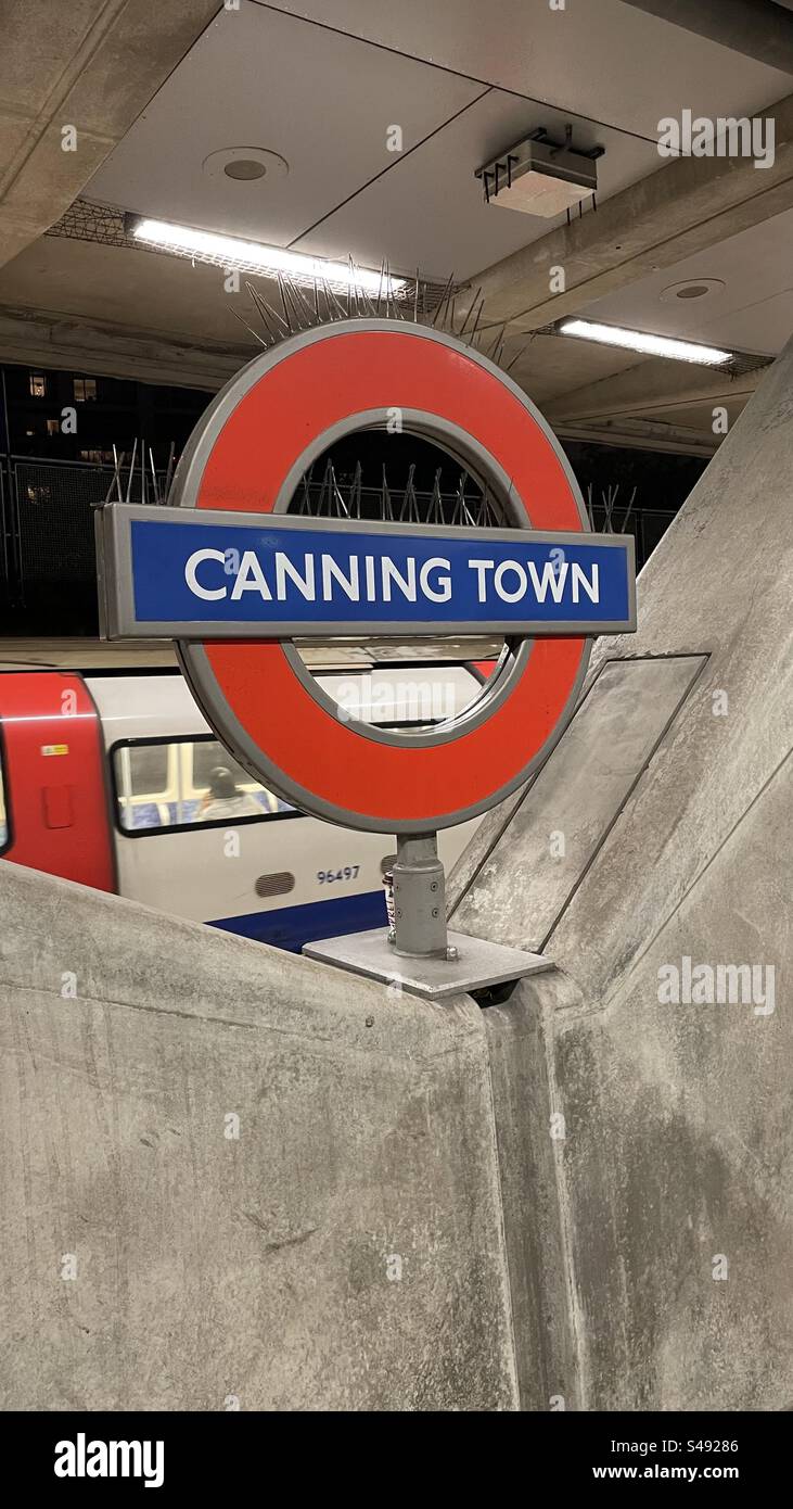 Canning Town tube station on the London Underground with a train visible in the background Stock ...