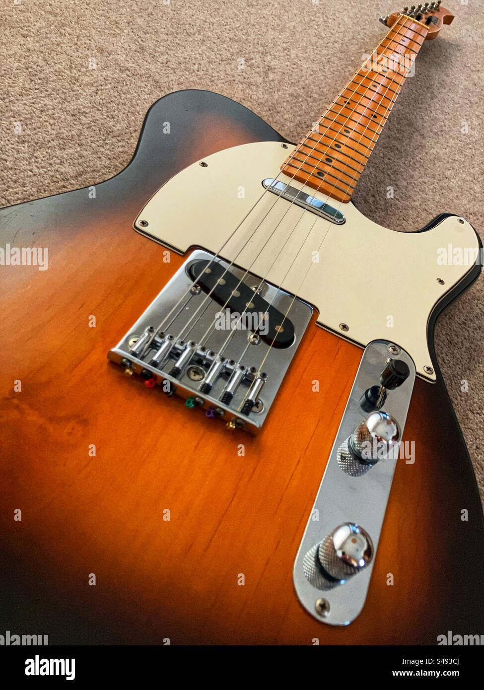 Telecaster guitar sunburst with white pick guard Stock Photo - Alamy