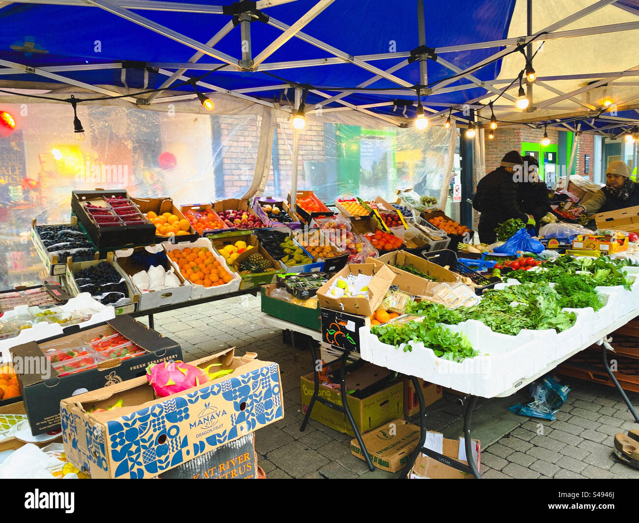 A fruit and veg market stall in Staines, UK with a selection of ...
