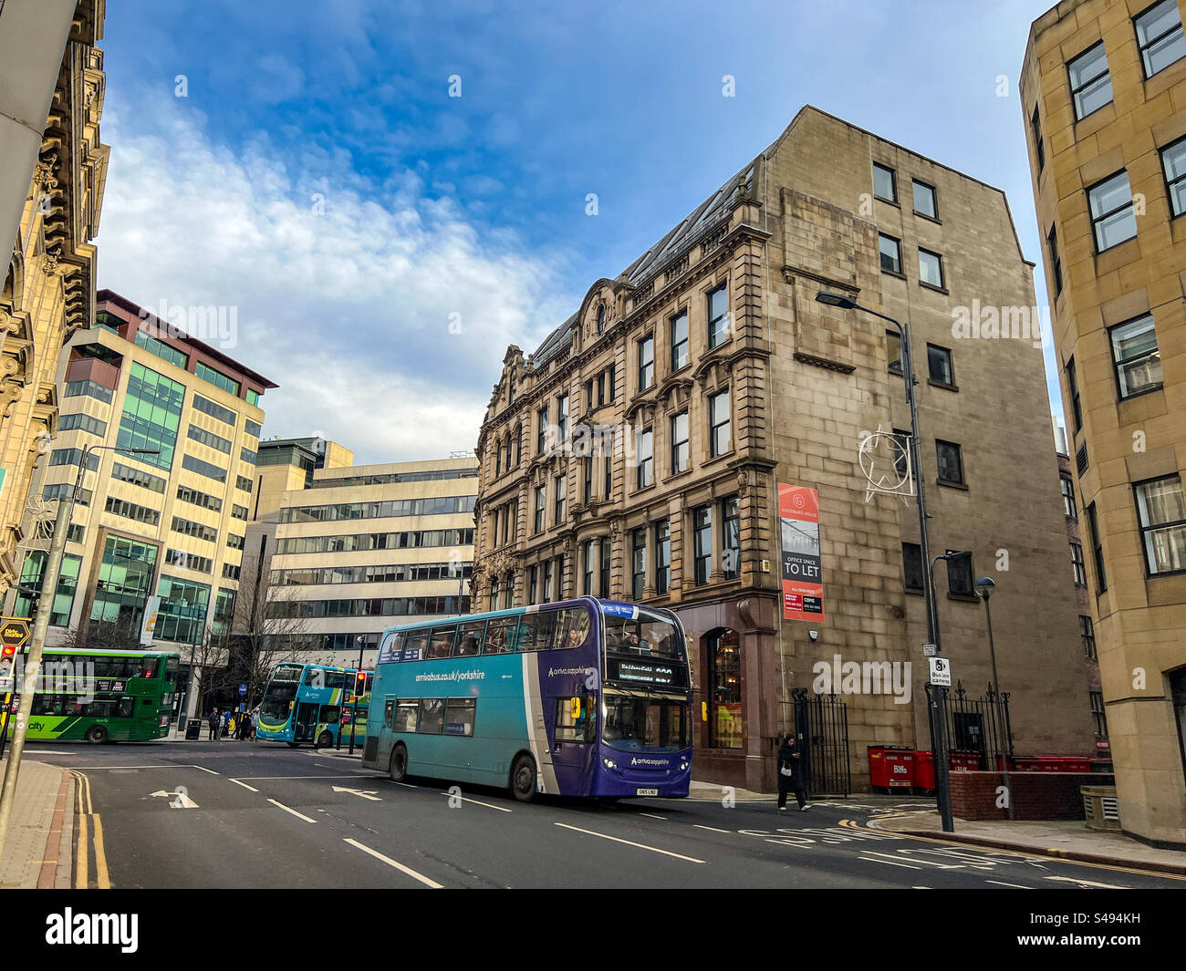 Victorian architectural buildings on Infirmary street in Leeds city ...