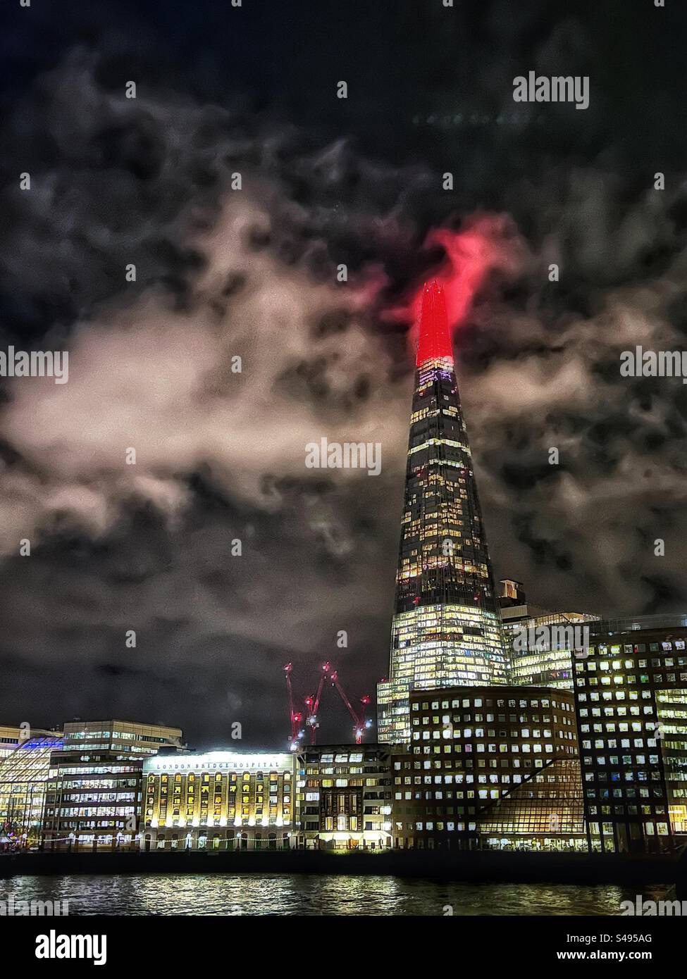 The Shard skyscraper with red light apex photography at night in London ...