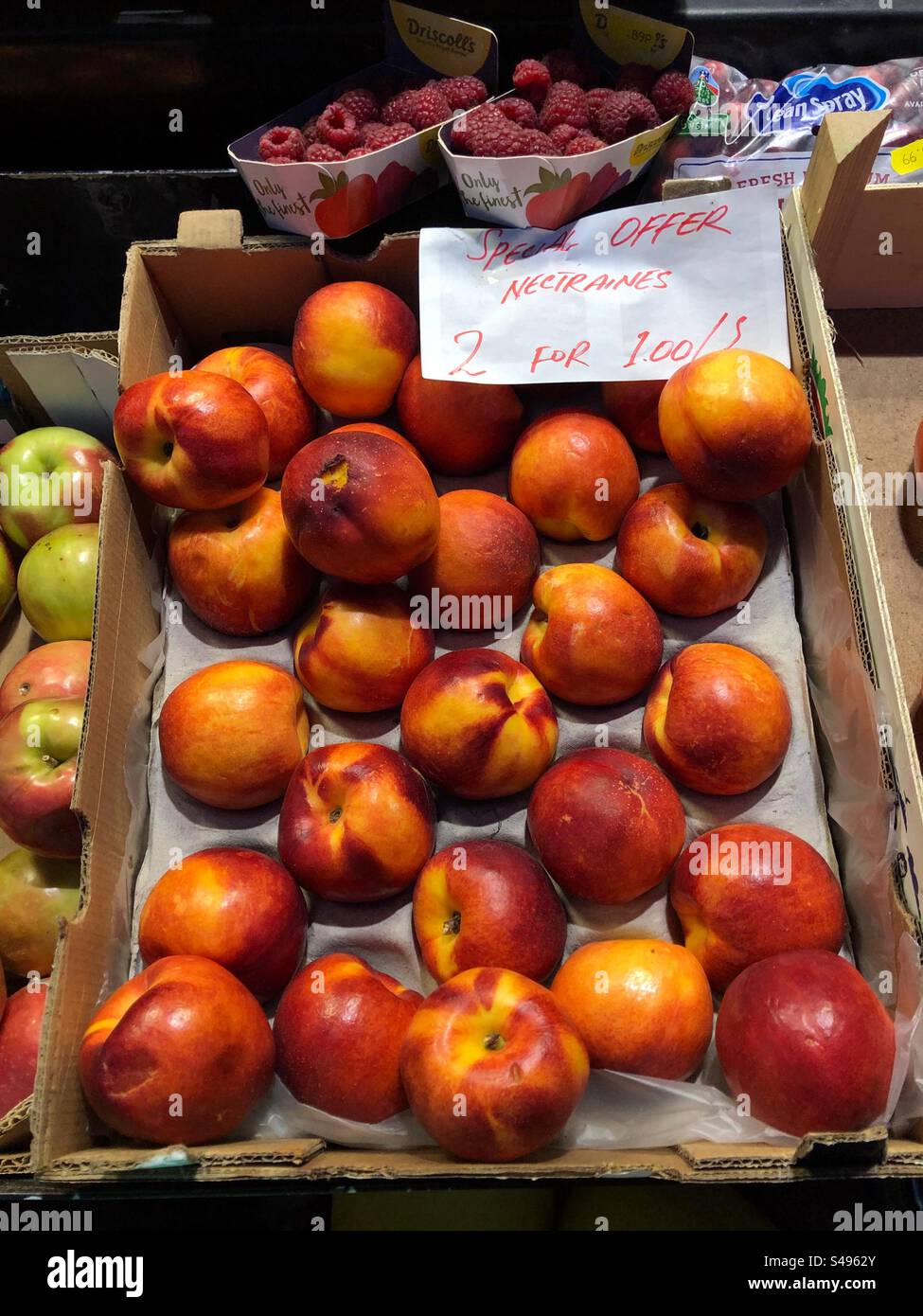 Nectarines priced up for sale at Grocer’s shop Stock Photo - Alamy