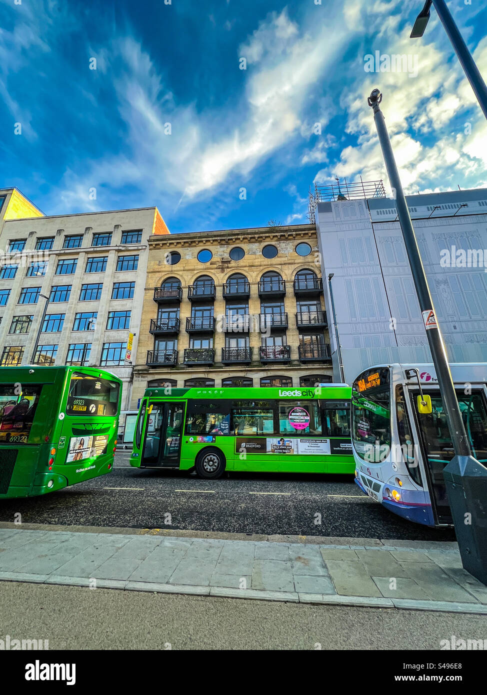 Public transport buses on The Headrow in Leeds city centre Stock Photo ...