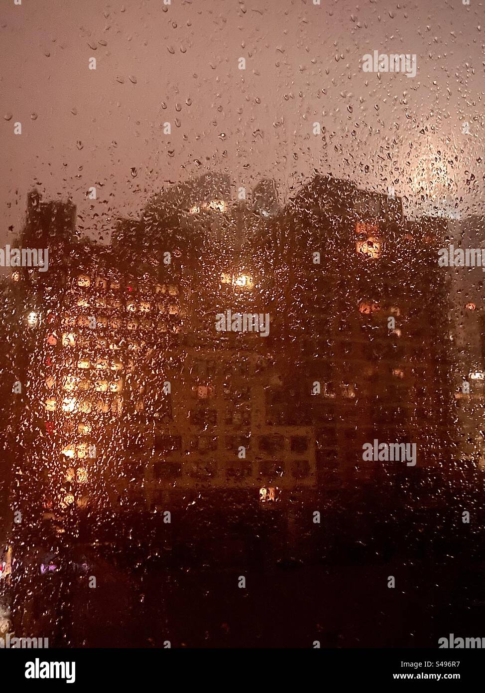 The Chrysler building and other skyscrapers seen through a rain ...