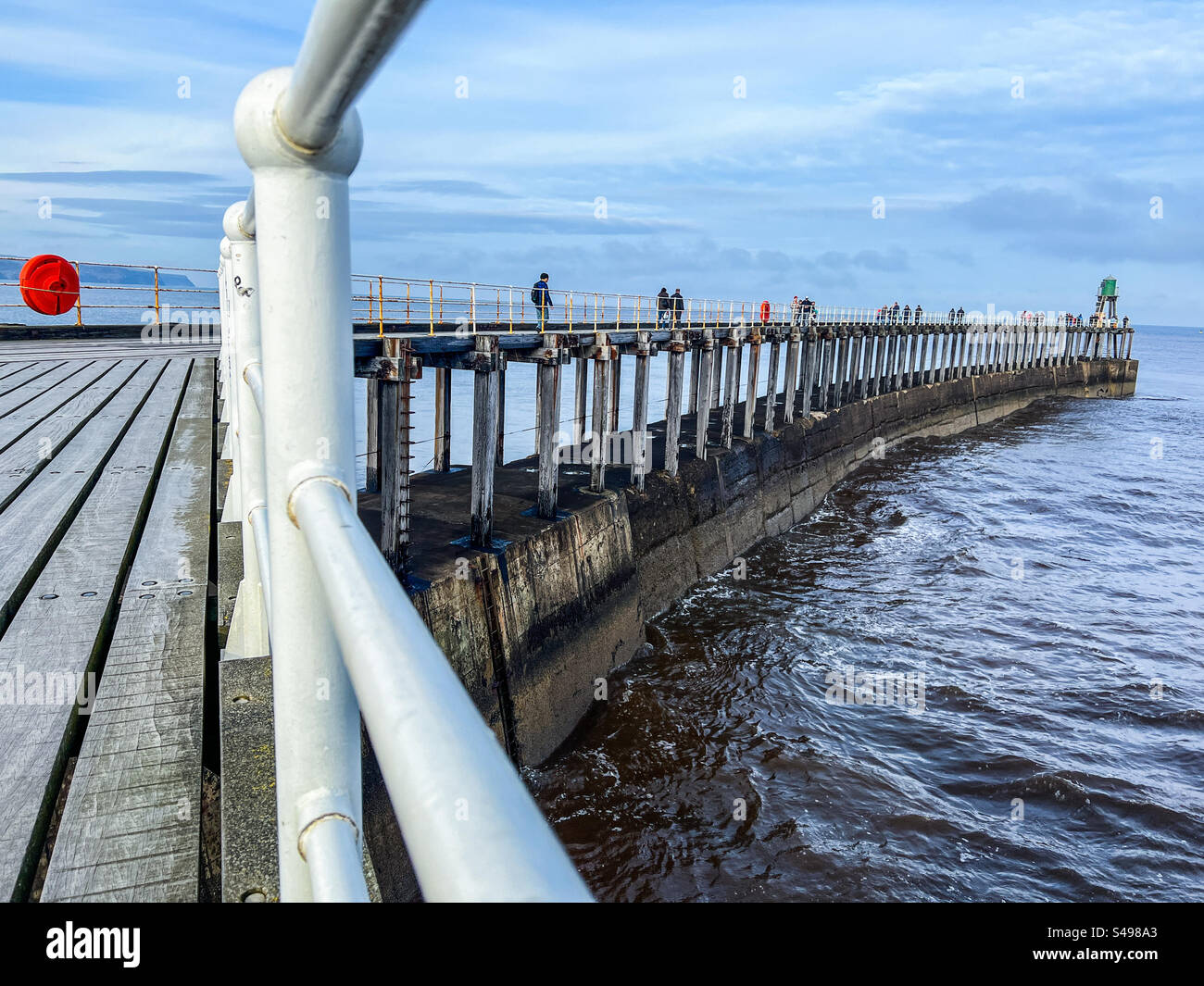 Whitby Pier on North Sea Stock Photo - Alamy