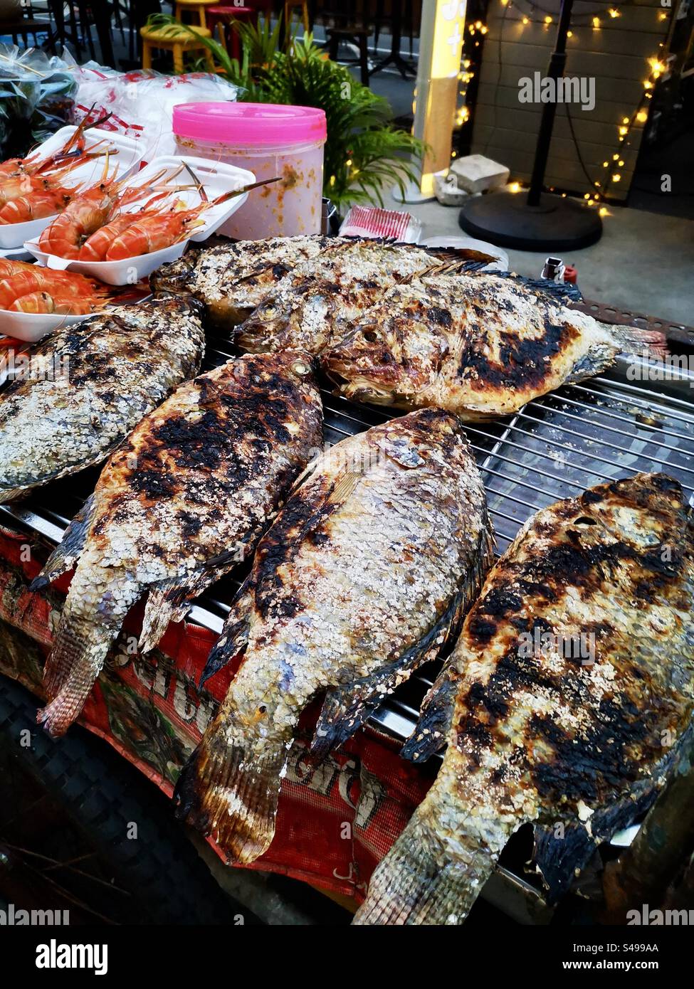 Pla Pao is a Thai salted grilled fish Stock Photo - Alamy