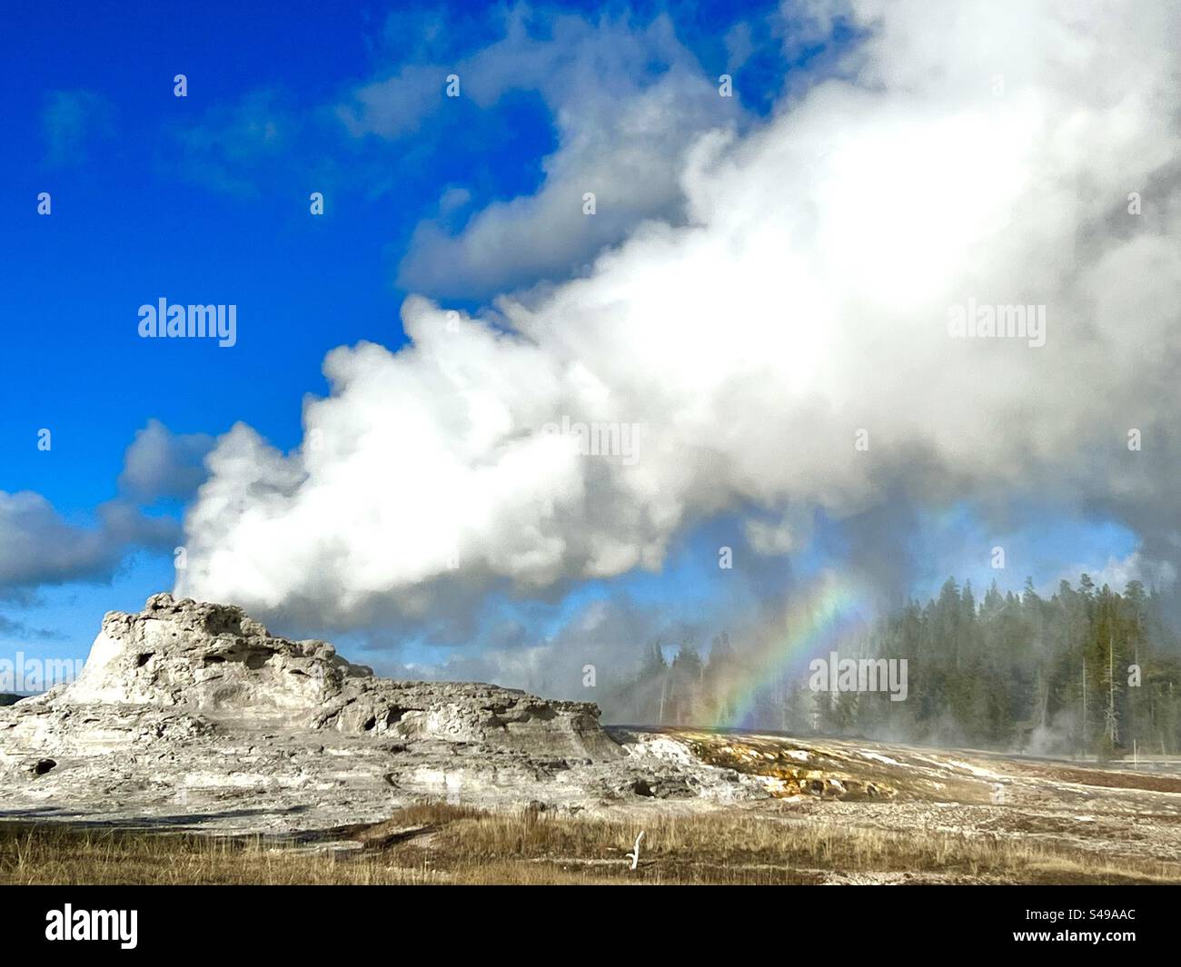 Geyser with rainbow hi-res stock photography and images - Alamy