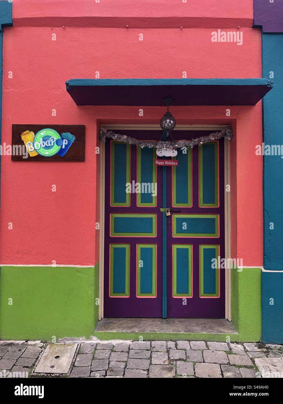 Colourful building exterior in Flores, Guatemala Stock Photo - Alamy