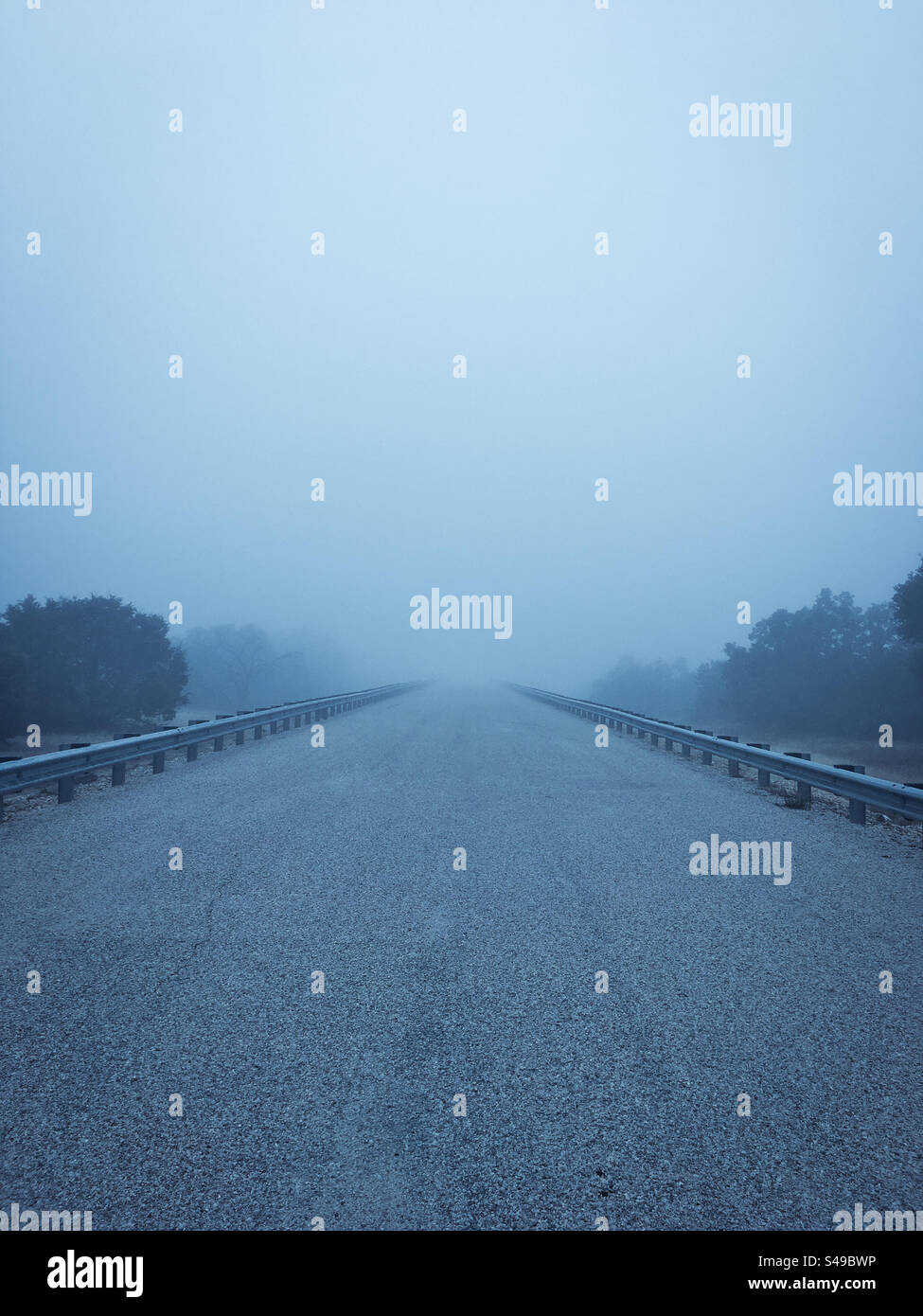 Misty pedestrian bridge Stock Photo - Alamy
