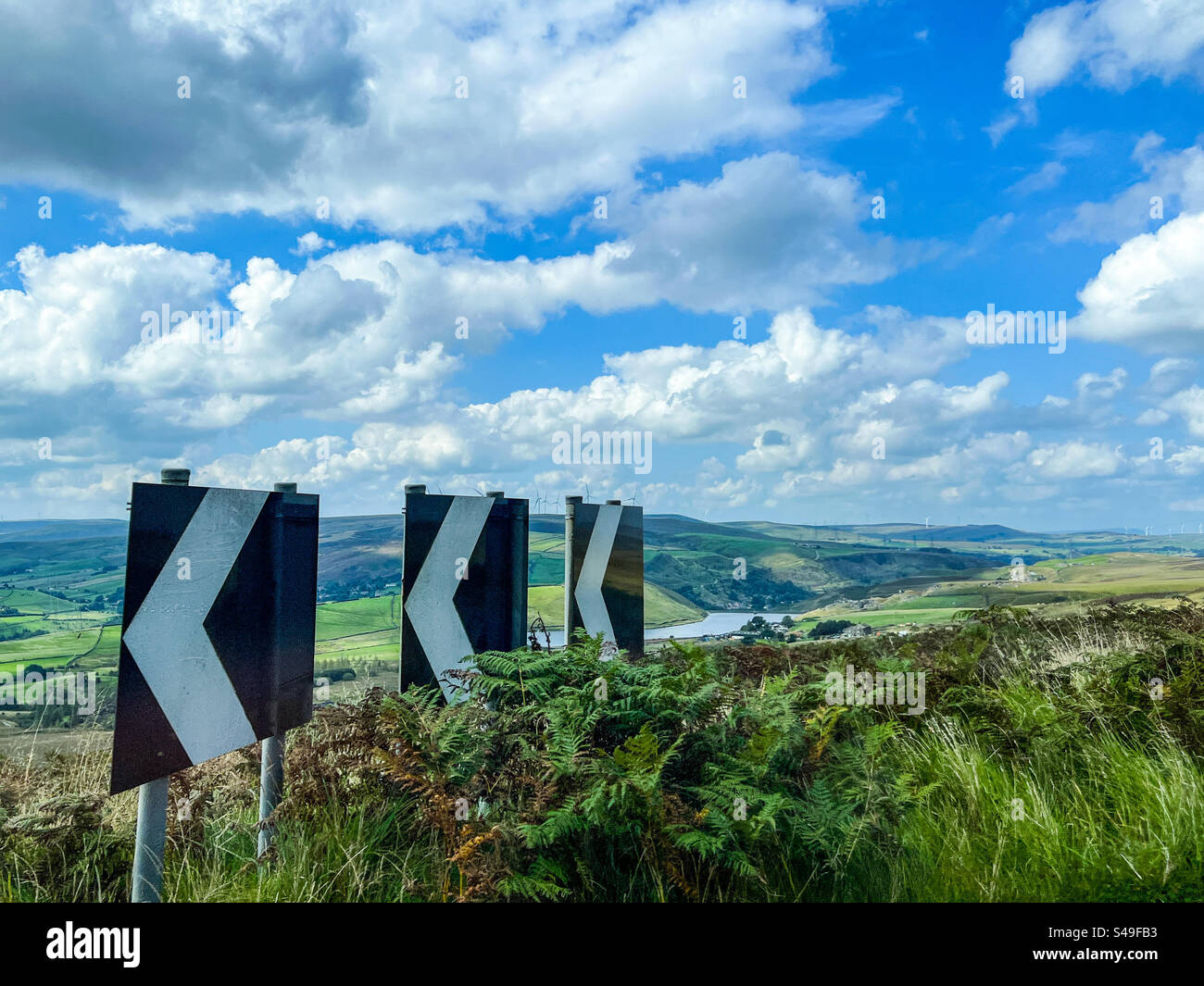 Sharp bend road sign on country road in Yorkshire Stock Photo - Alamy