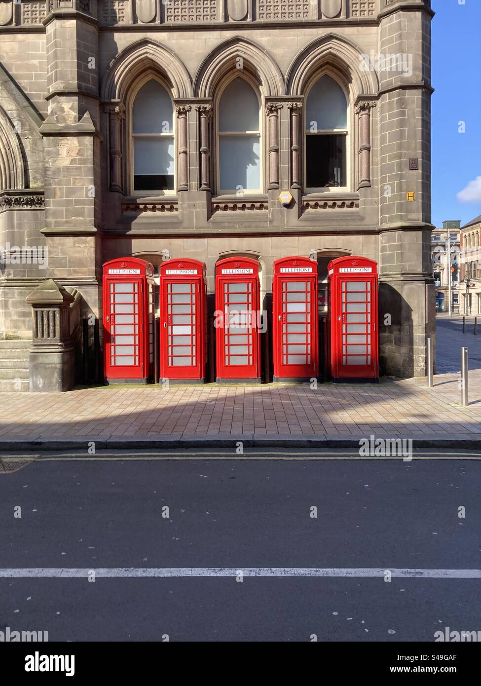 Five red telephone boxes in Middlesbrough, United Kingdom Stock Photo ...