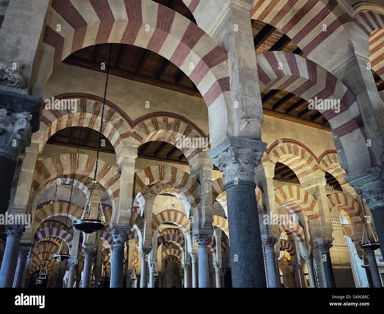 Decorated arches and columns inside the Mosque-Cathedral of Córdoba ...