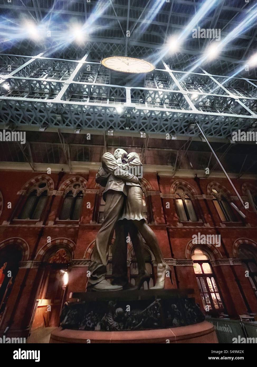 A 9m tall bronze statue of a couple's embrace by sculptor Paul Day also ...