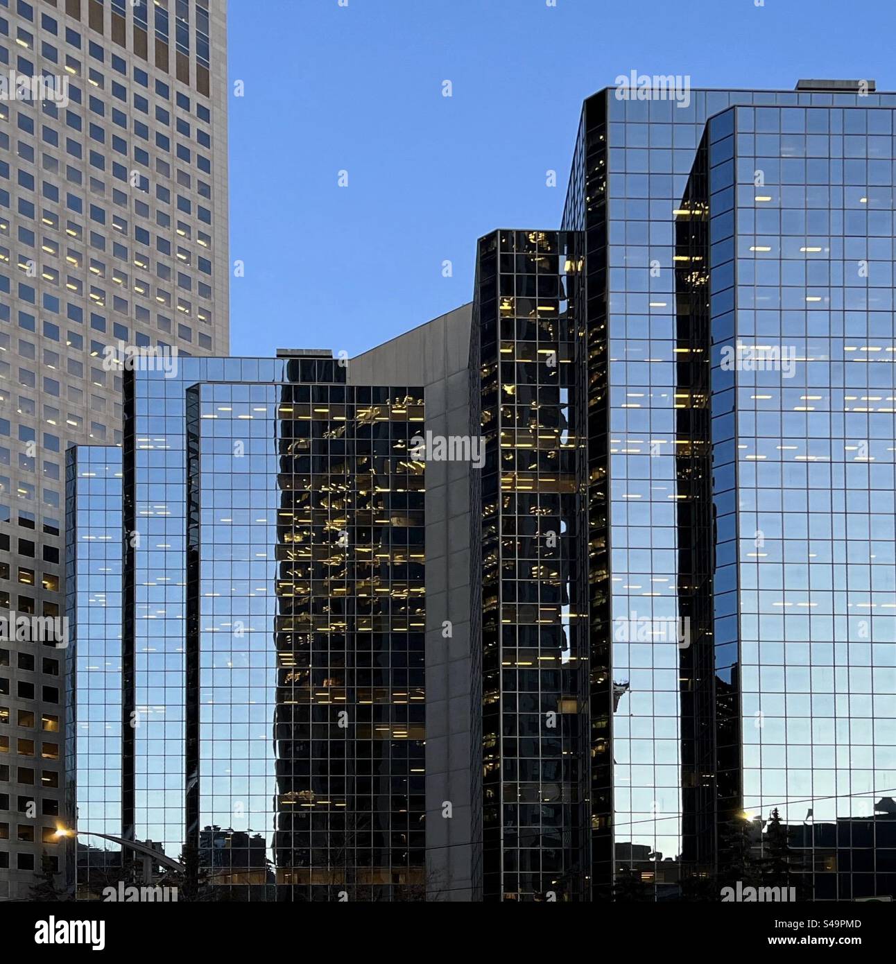 City buildings in downtown Calgary during the dawn blue hour Stock ...