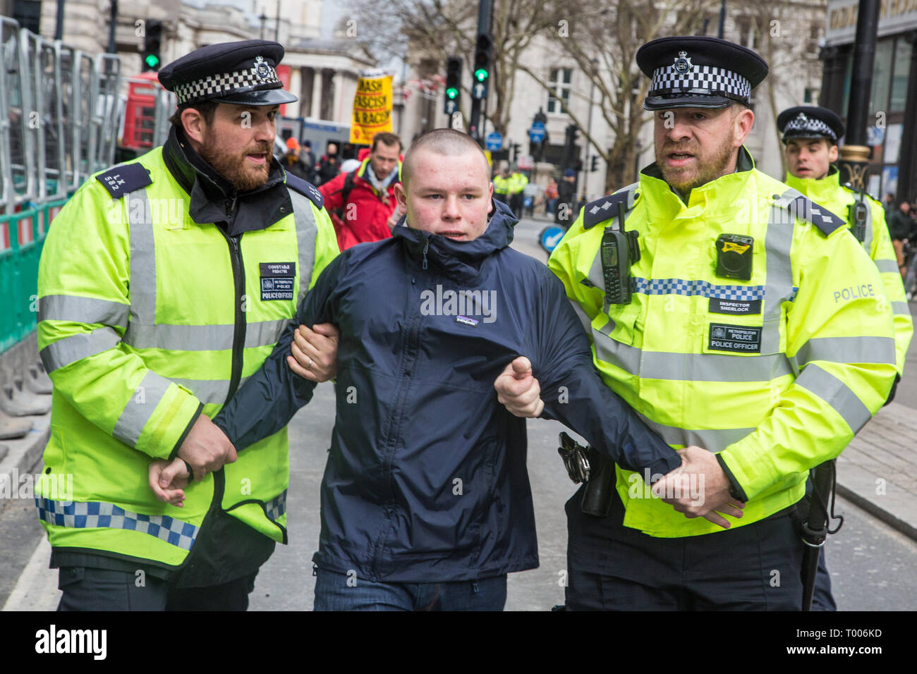 London UK 16th March 2019 A man is detained by police for taunting ...