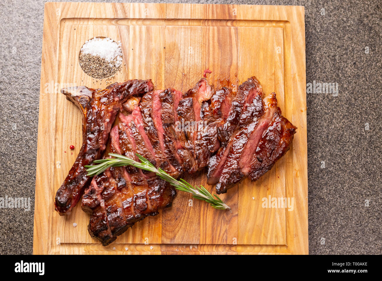 food, delicious, horse meat and craft concept - serving of grilled ...