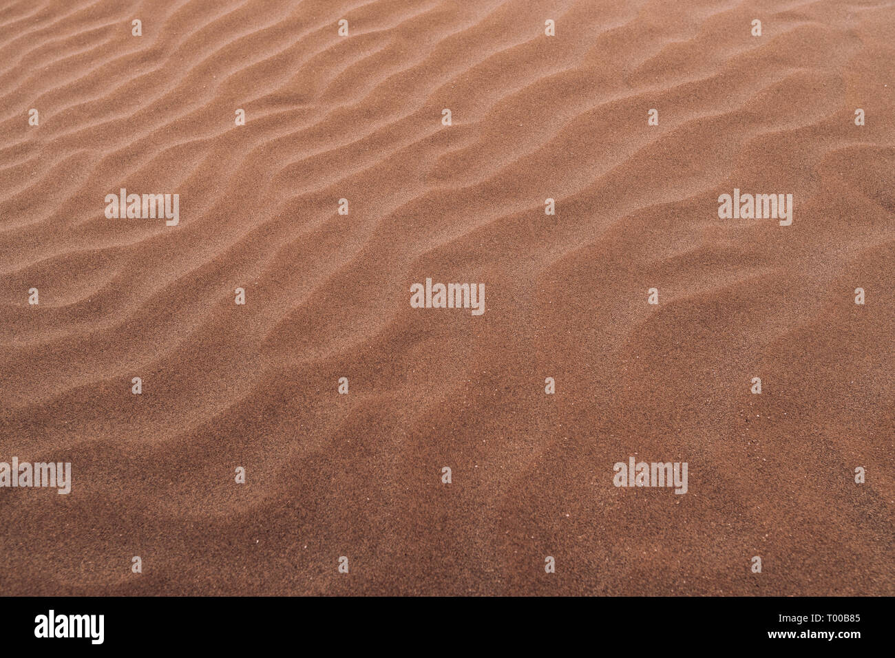 Sand dunes background Stock Photo - Alamy