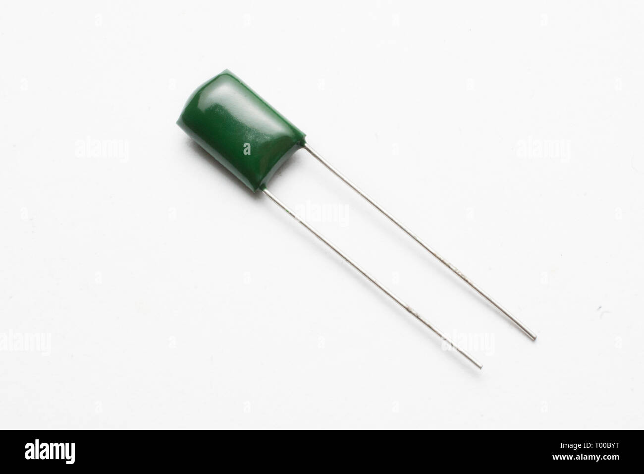 Ceramic capacitor used in electronic (generic capacitor) on white ...