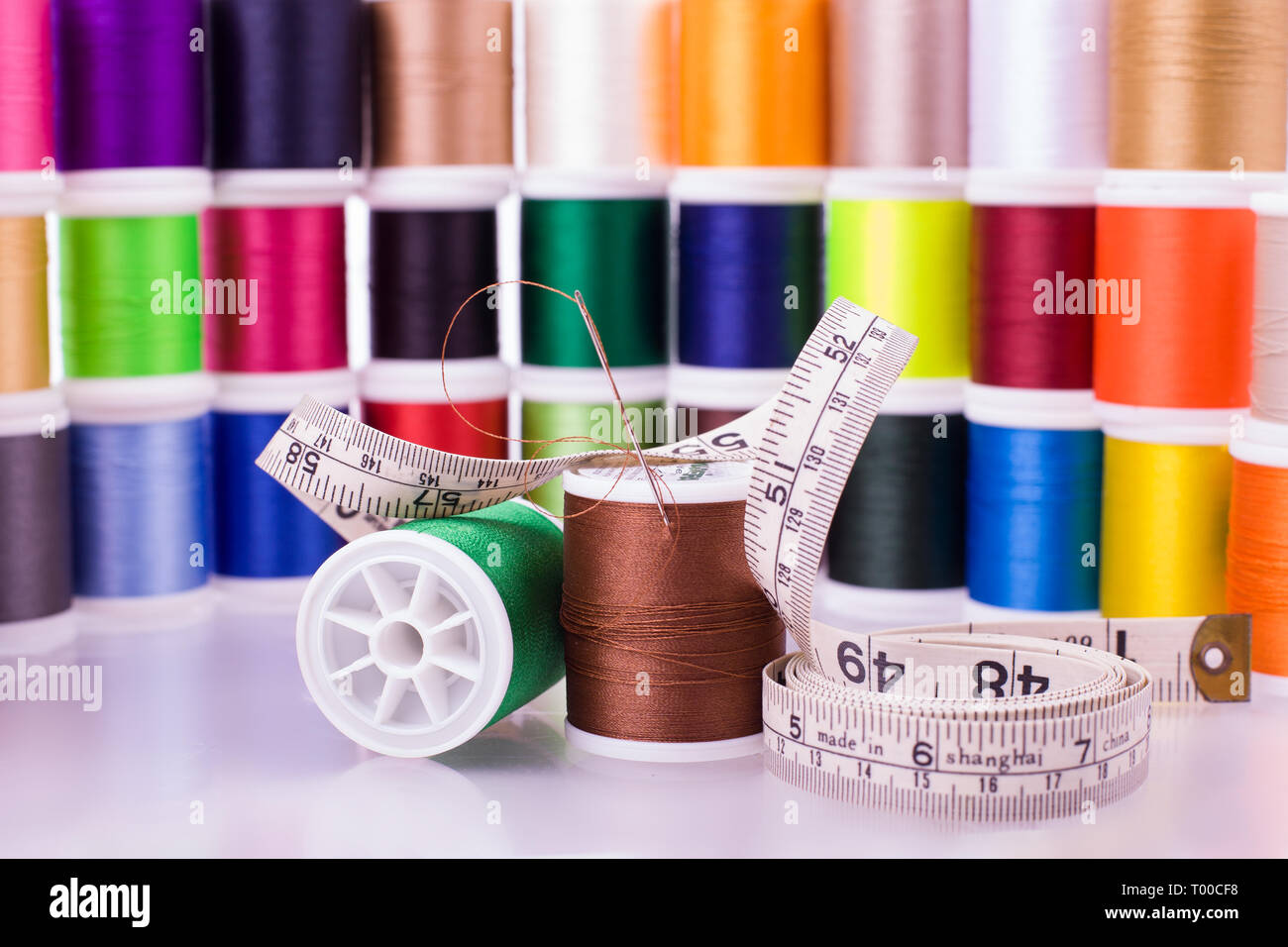 Composition with tailor threads - tools for sewing. Reel with thread ...