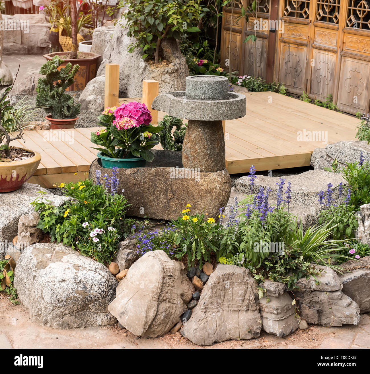 Chinese traditional style stone mill in Chinese old ancient building ...