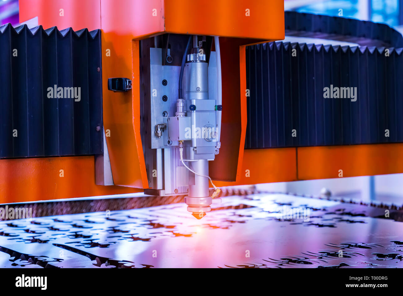 laser cutting machine controller by CNC program Stock Photo - Alamy