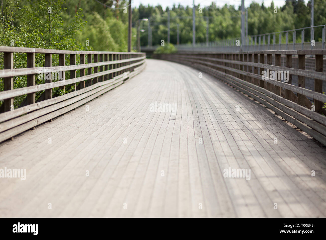 Wooden walkway bridge outdoors Stock Photo - Alamy