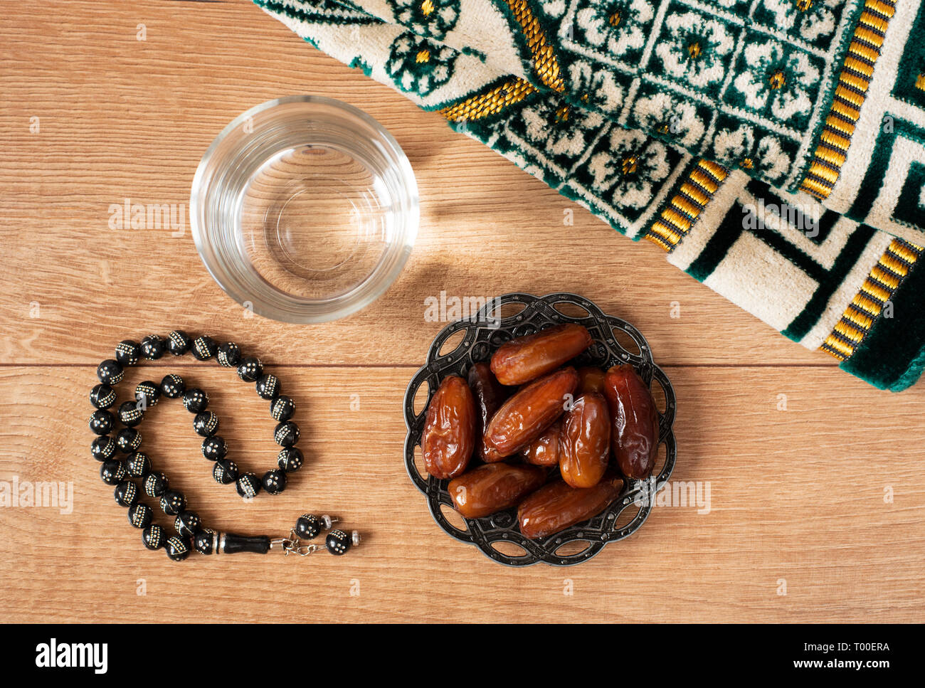 Water and dates. Iftar is the evening meal. View of decoration Ramadan ...