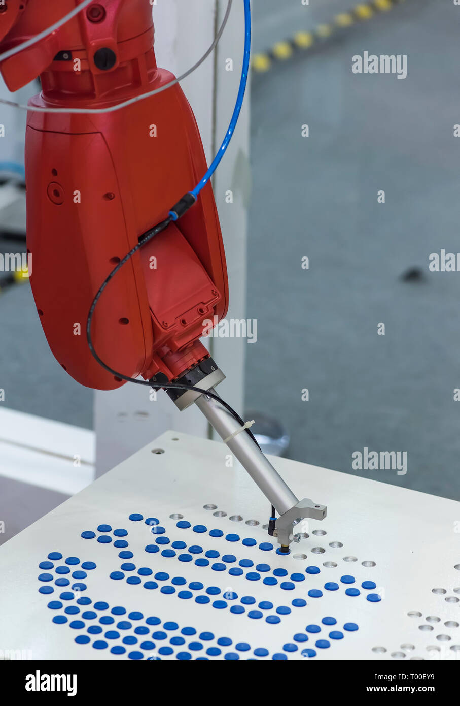 robotic and pneumatic piston sucker unit on industrial machine ...