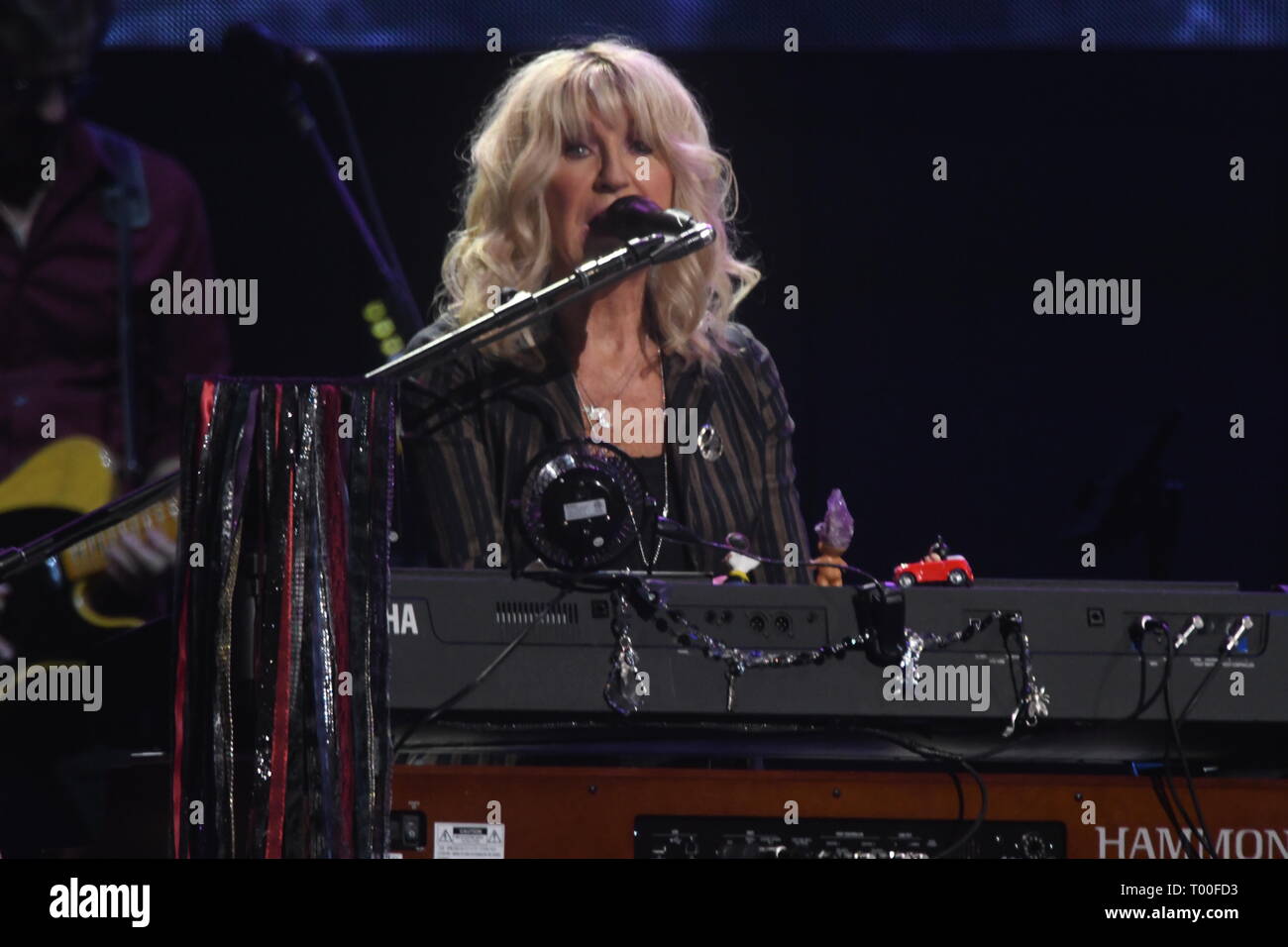 Singer and keyboardist Christine McVie is shown performing on stage ...