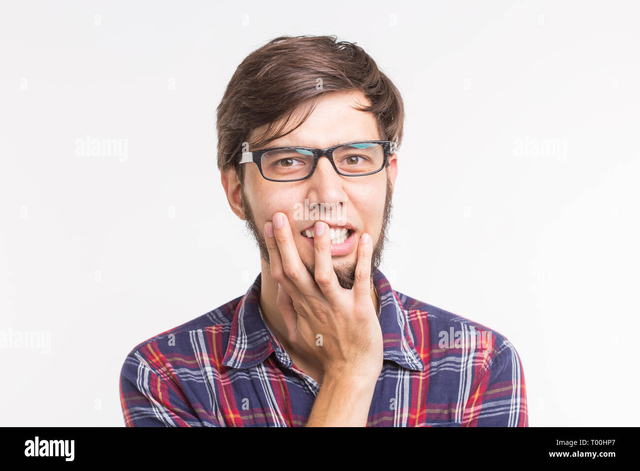 Expression and gesture concept - Handsome man with awkward face Stock ...