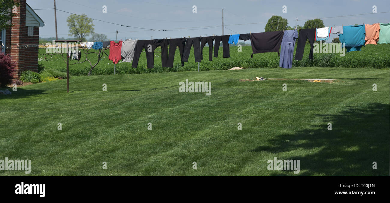 Spring day with laundry on a clothesline hanging to dry Stock Photo - Alamy