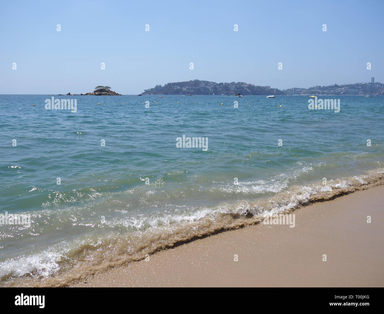 Water waves of bay at ACAPULCO city in Mexico and Pacific Ocean ...