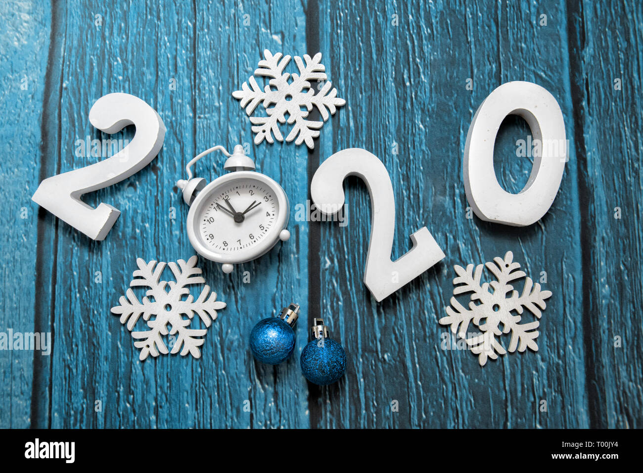 Happy New Year. 2020 numbers on blue background Stock Photo - Alamy