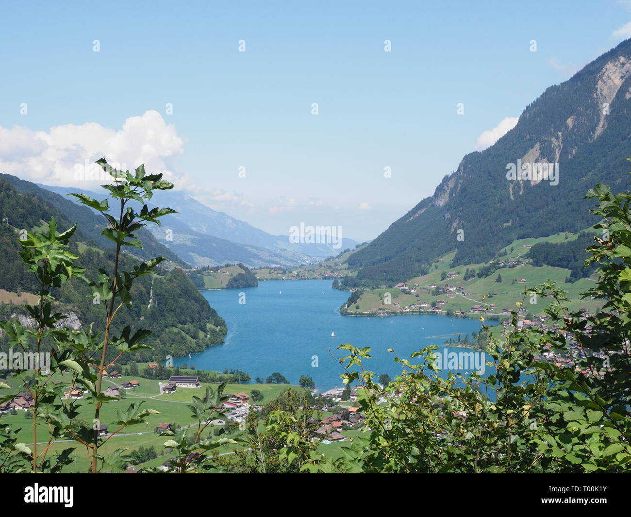 Lake Brienz seen from Brunig Pass in Switzerland with clear blue sky in ...