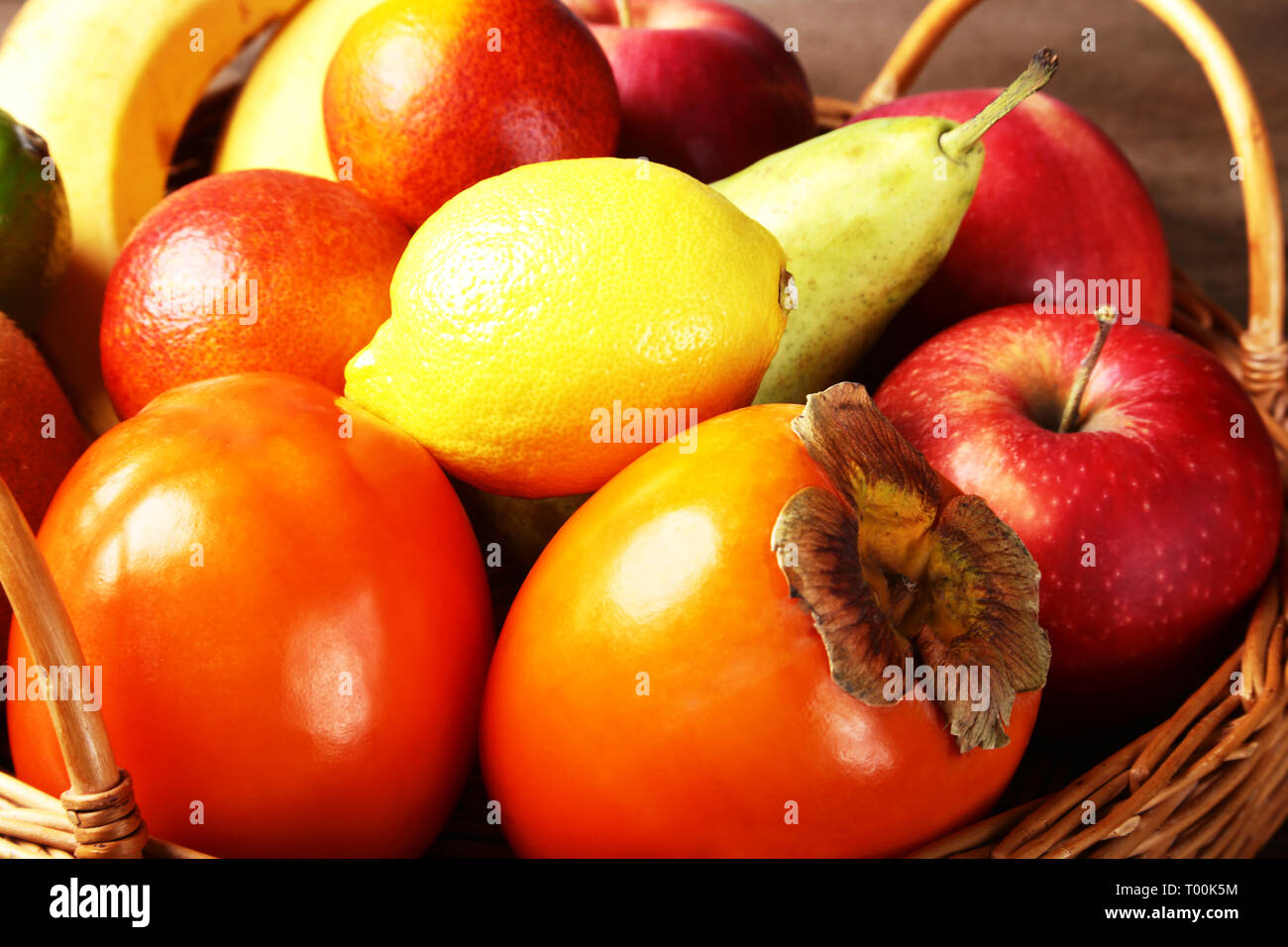 Fresh mixed exotic fruits in basket. Fruits background. Healthy eating ...