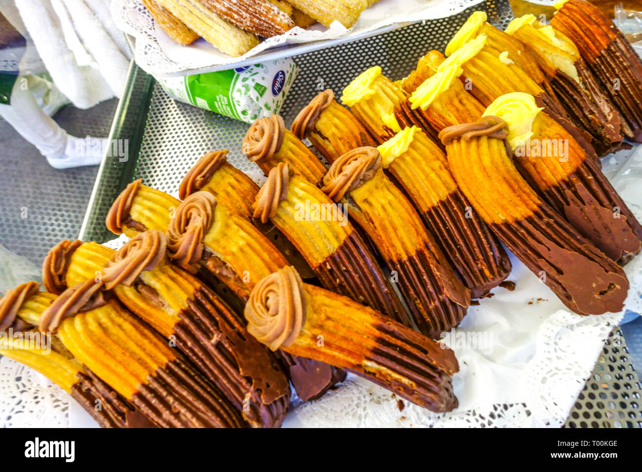 Valencia churros, cakes, and sweets sold during the festival Las Fallas ...