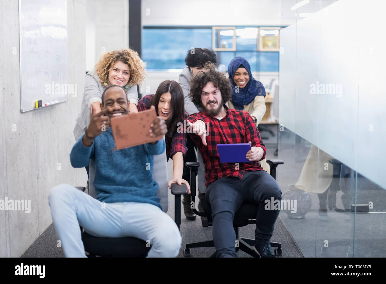 multiethnics startup business team of software developers having fun ...