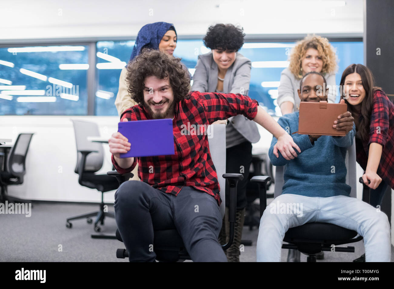 multiethnics startup business team of software developers having fun ...