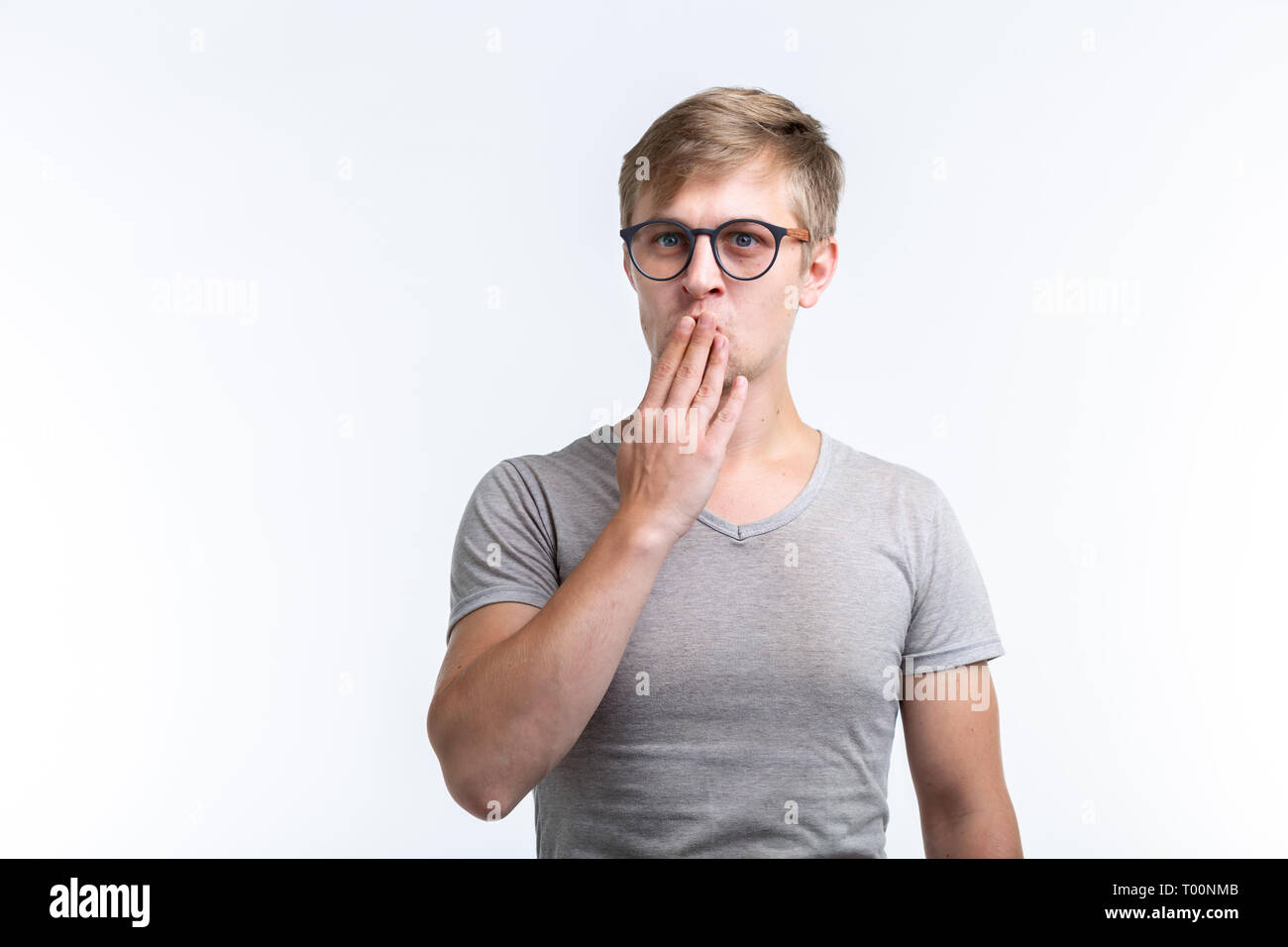 People and emotions concept - Shocked surprised man over white ...