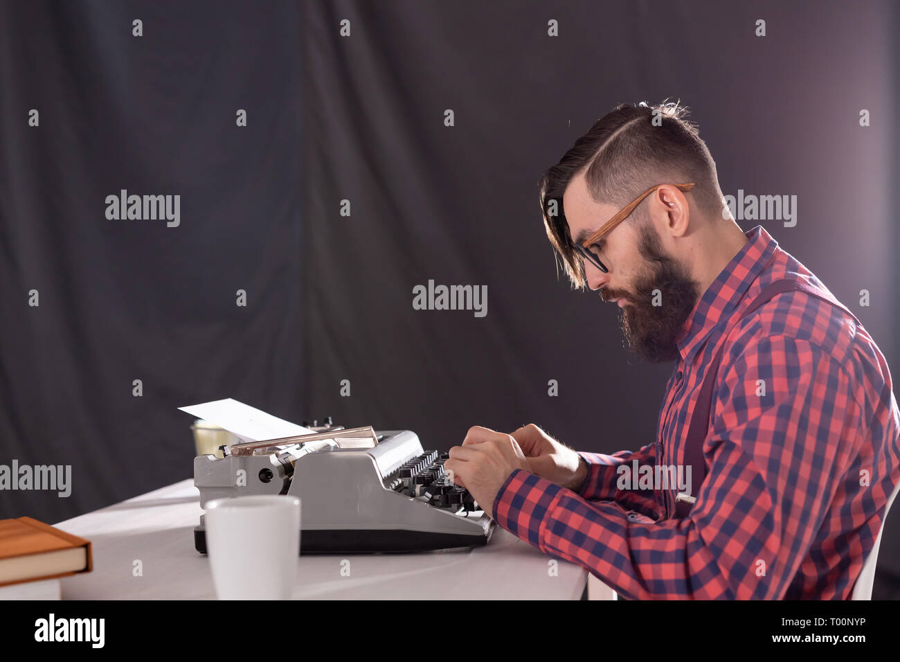 People and technology concept - Portrait of writer working on ...