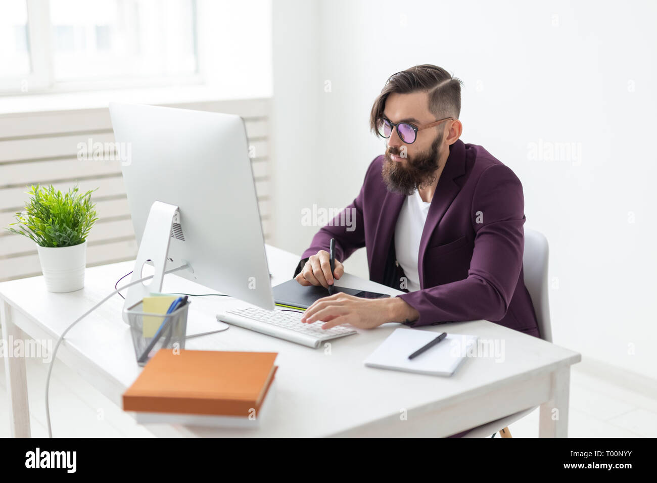 people, design and style concept - graphic designer sketching new ...