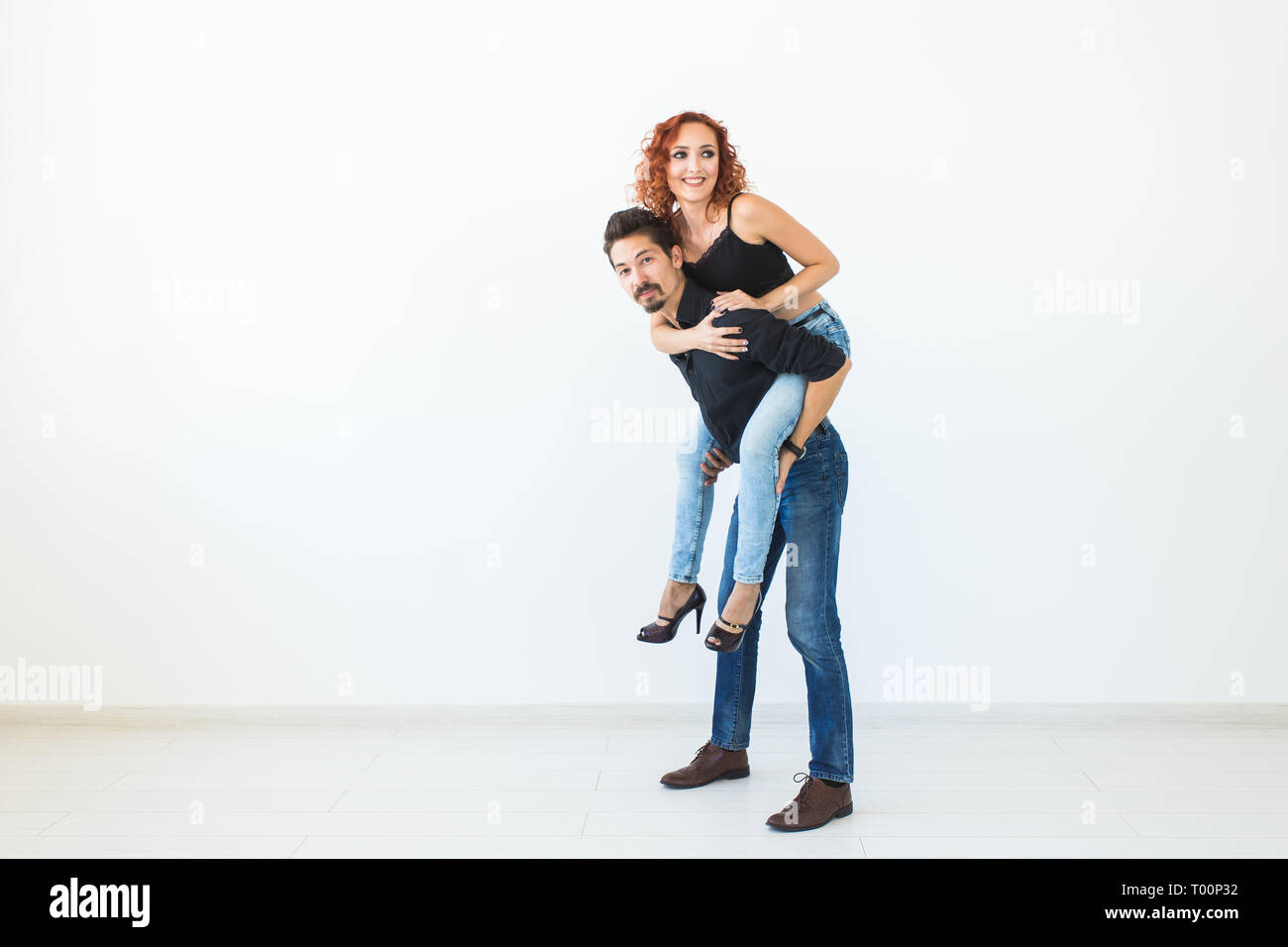 Woman Sitting On Mans Back High Resolution Stock Photography and Images ...