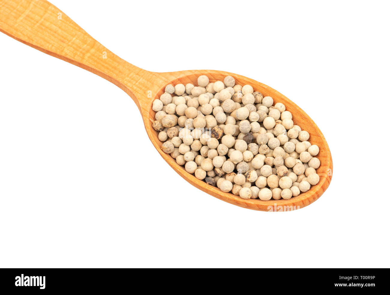 Wooden spoon with white pepper peas on white background Stock Photo - Alamy
