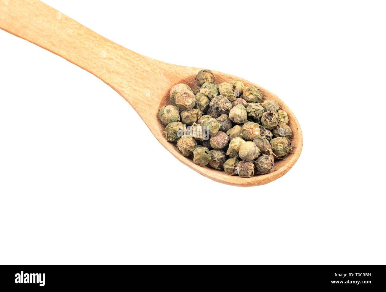 Small wooden spoon with green pepper peas on white background Stock ...