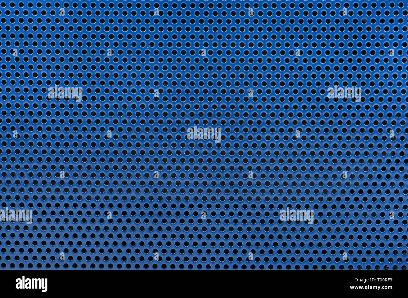 Blue background of metal mesh in the hole close-up Stock Photo - Alamy