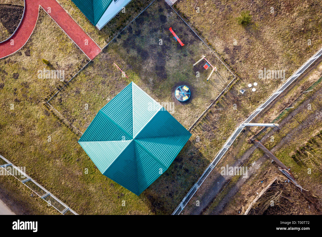 Aerial top view of shingle roof of kindergarten or modern school ...