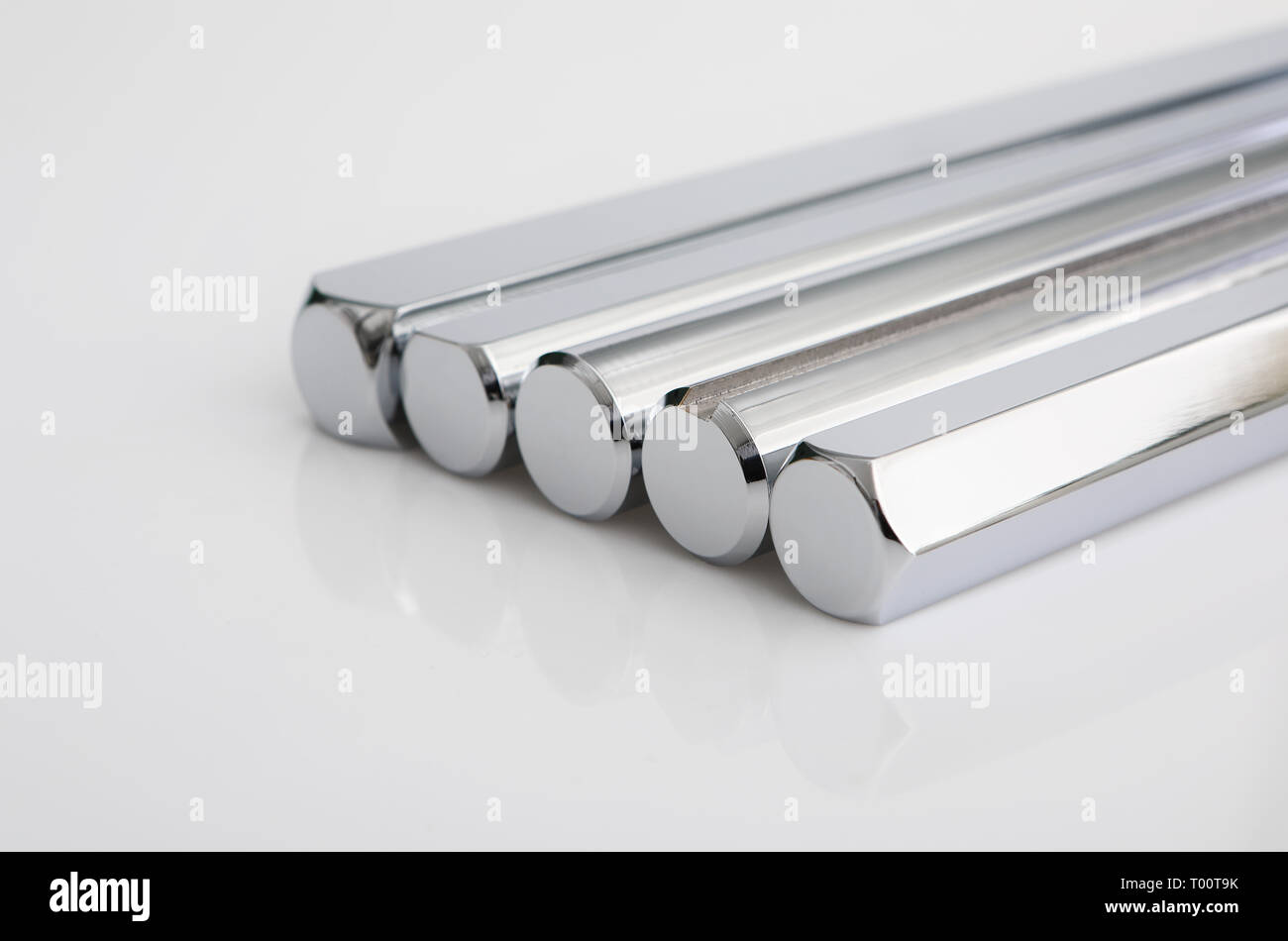 Steel rods of different types. Isolated on white background Stock Photo ...