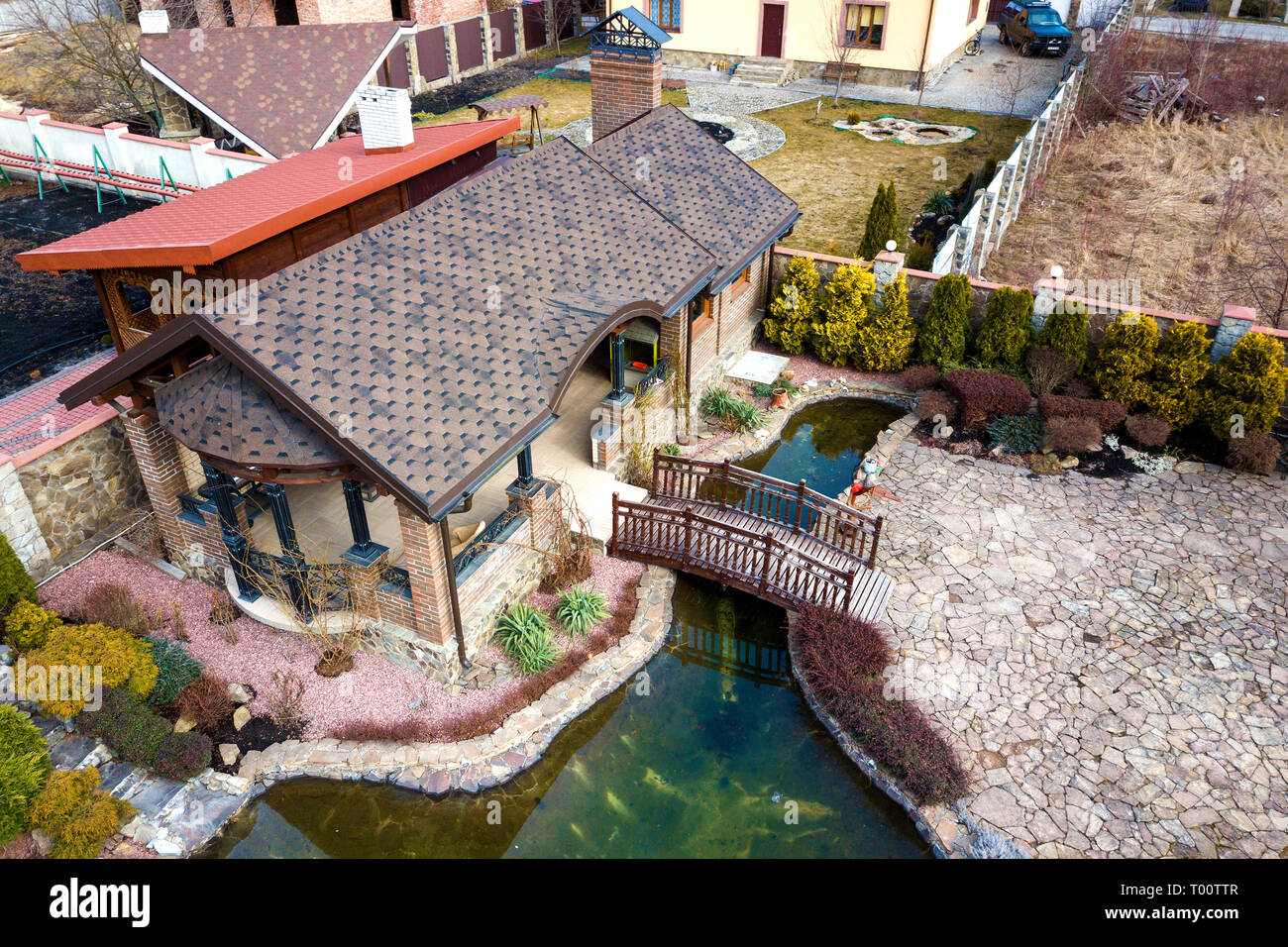 Aerial view of beautifully landscaped recreation house cottage complex ...